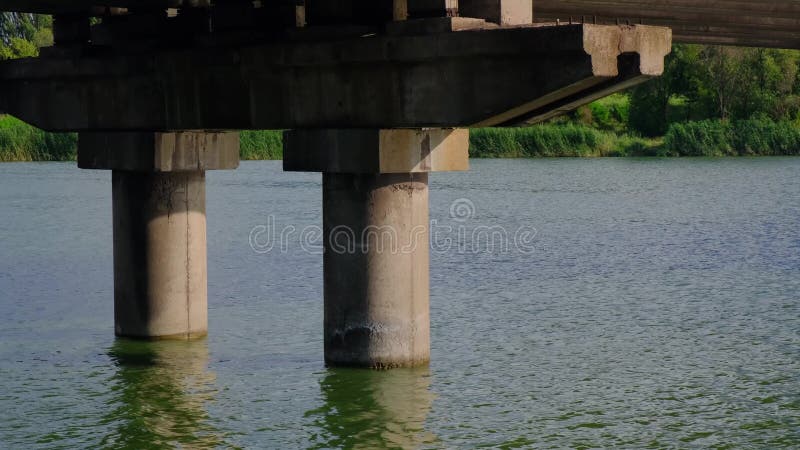 Concrete Supports of a Bridge Over River. Stock Video - Video of sunny ...