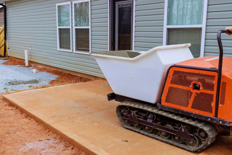 Concrete is Transported at Construction Site Using a Self Dumping ...