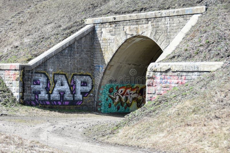 Concrete Tunnel in the Ground Painted Graffiti Stock Image - Image of ...