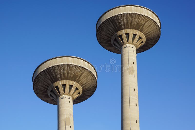 Concrete Two Water Towers Against Blue Sky Stock Photos - Free ...