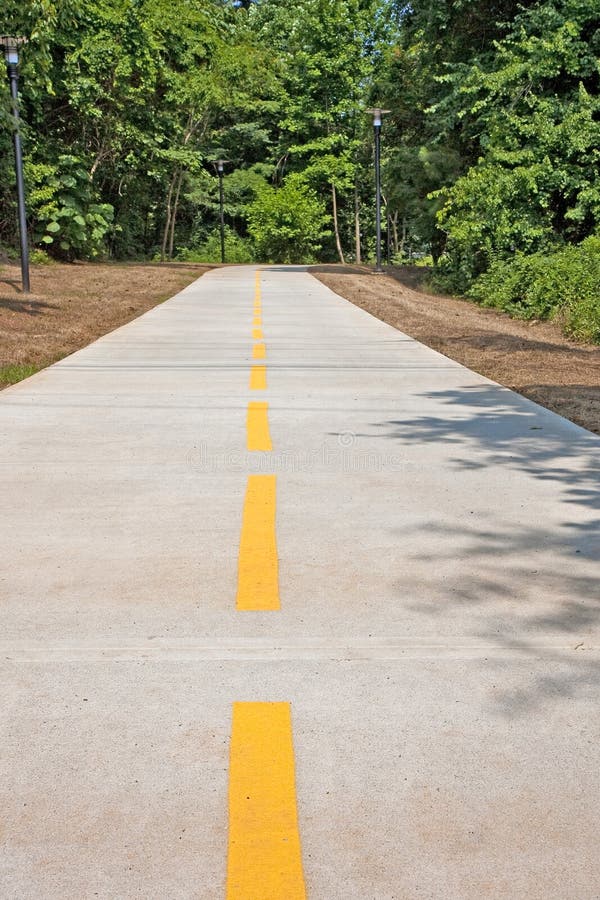 Concrete Walkway into Trees Stock Image - Image of walking, trail: 11259143