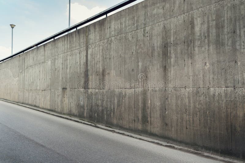 Concrete Wall and Asphalt Road Stock Image - Image of place, garage ...