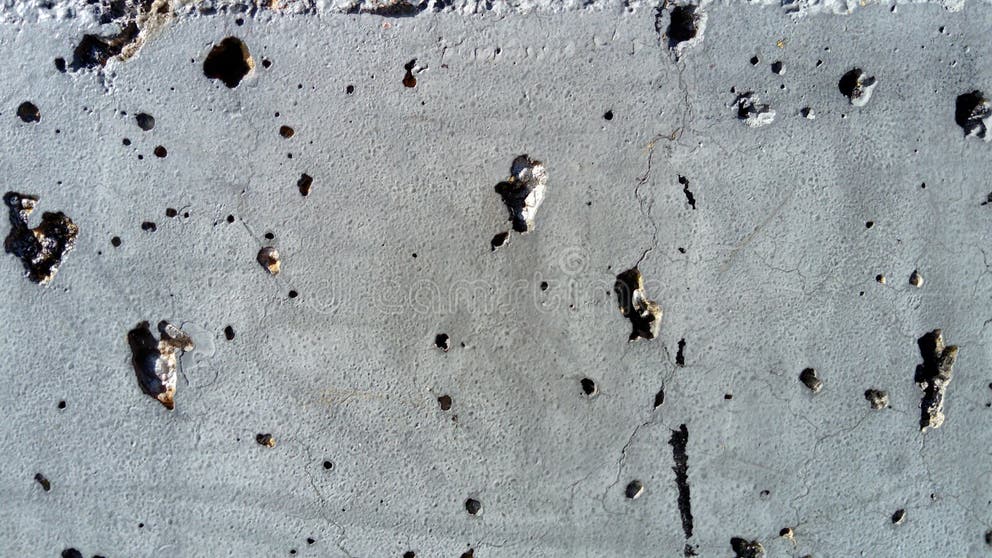 Concrete Wall with Concentric Damage of Large Radius. Potholes ...