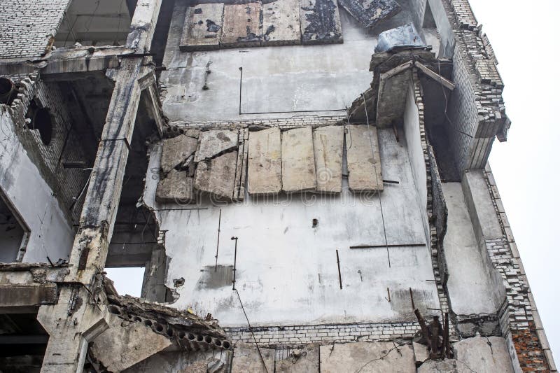 The Concrete Wall of the Destroyed Large Building with Hanging Concrete ...