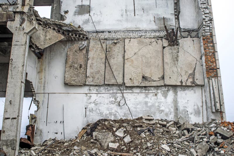 The Concrete Wall of the Destroyed Large Building with Hanging Concrete ...