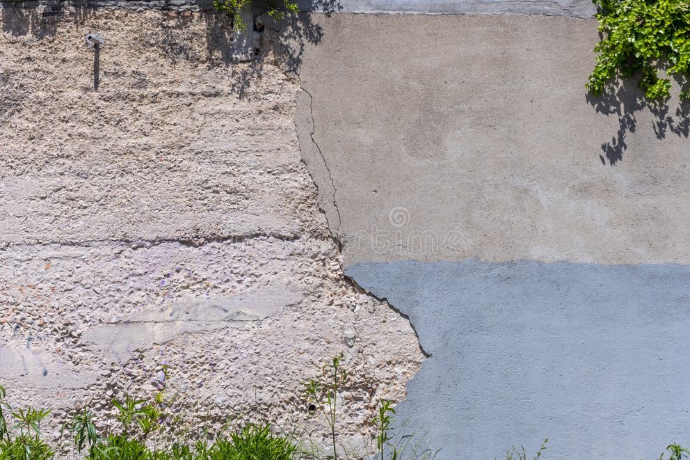 A Concrete Wall with Half of the Plaster Fallen Stock Image - Image of ...
