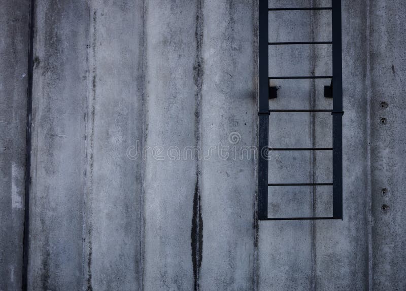 Concrete wall with ladder stock photo. Image of estate - 234652054
