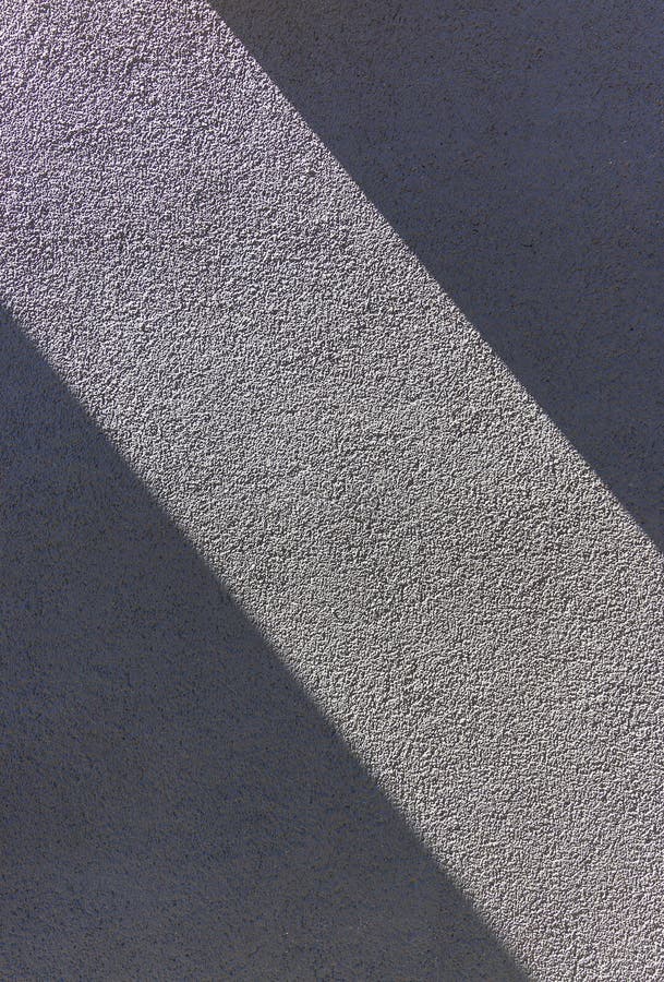 Concrete Wall Painted with Figures As a Backdrop Under the Light of the ...