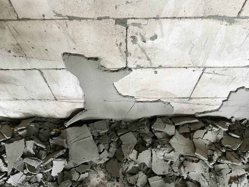 Concrete Wall Texture, Cracked Cement Plaster on a Concrete Block Wall ...