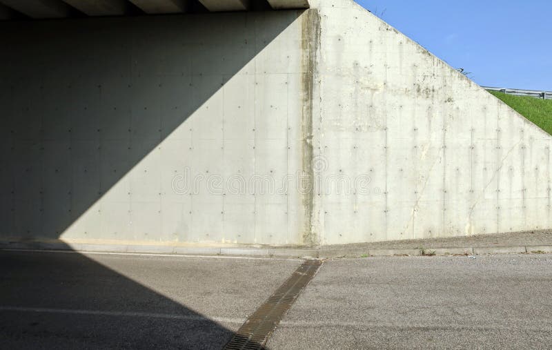 Concrete Wall of an Underpass Divided in Two by the Shadow of the ...