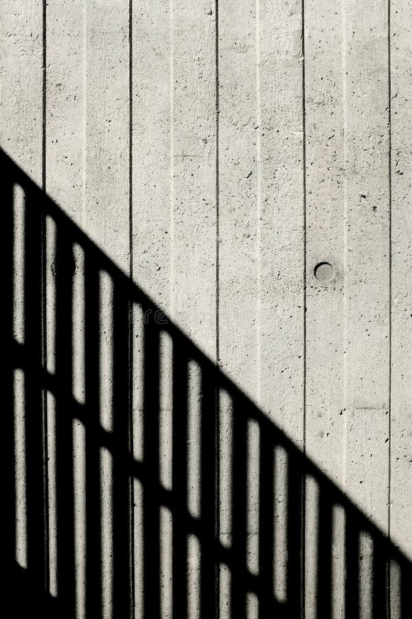 Concrete Wall with Vertical Lines and a Shadow Stock Image - Image of ...