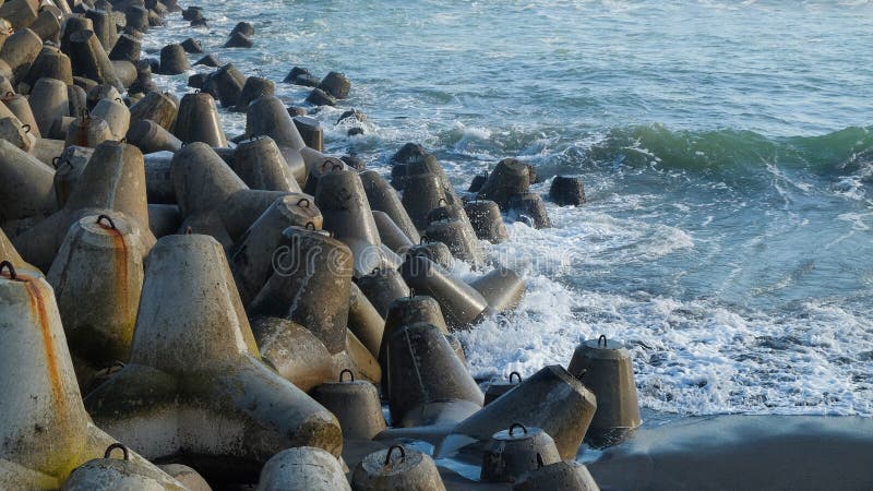 Concrete Wave Breakers on the Beach with Abstract Shapes, Patterns and ...