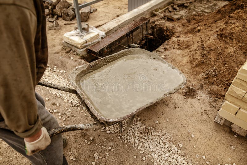Concrete in a Wheelbarrow at a Construction Site Stock Image - Image of ...
