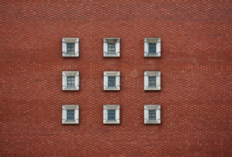 9 Concrete Windows Square and a Red Brick Wall Stock Photo - Image of ...