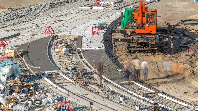 Concrete Works for Road Construction with Many Workers and Mixer ...