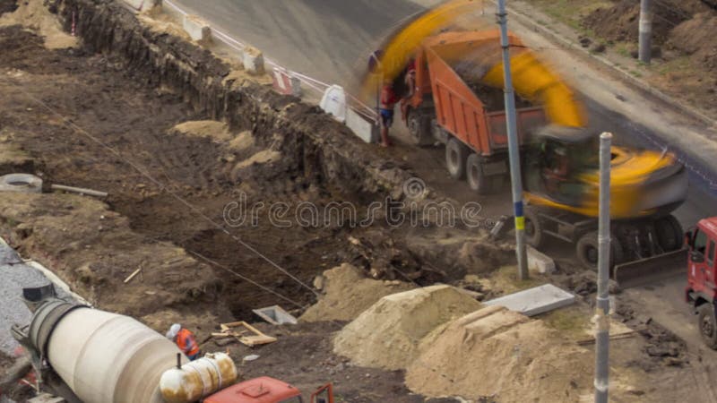 Concrete Works for Road Construction with Many Workers and Mixer ...