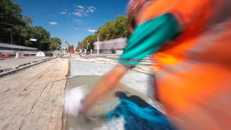 Concrete Works for Road Construction with Many Workers and Mixer ...