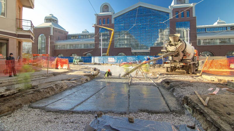 Concrete Works for Road Maintenance Construction Site with Many Workers ...