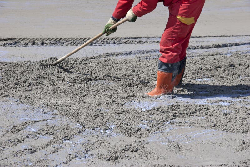 Man raking concrete stock photo. Image of work, pour, occupation - 6847200