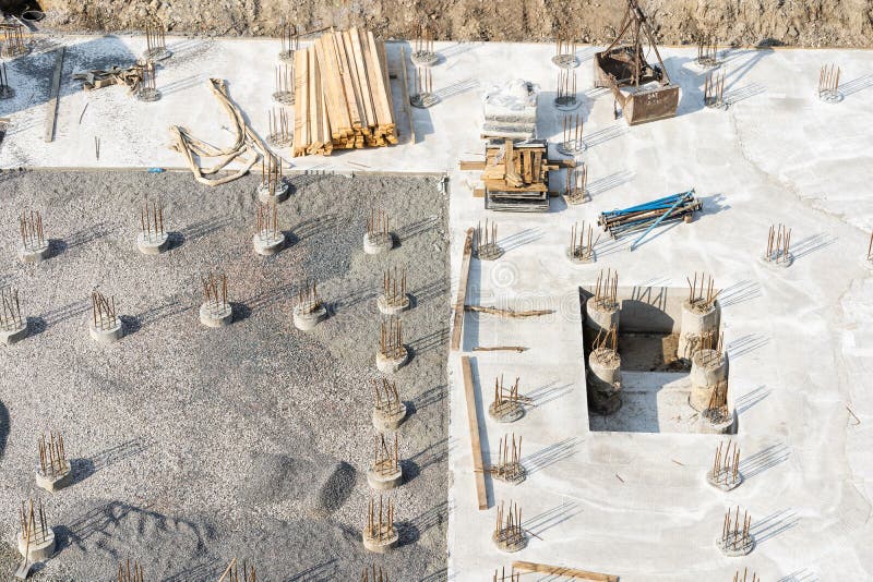Concreting Work: Construction Site Worker during Concrete Pouring into ...