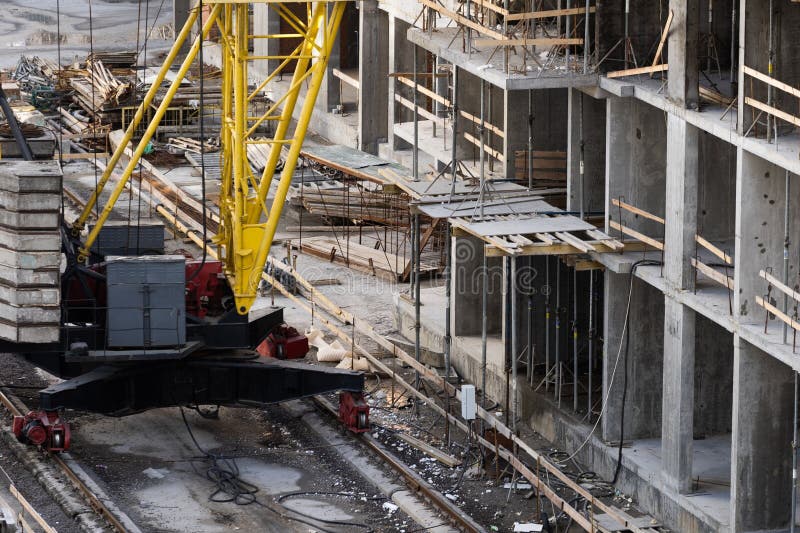 Concreting Work: Construction Site Worker during Concrete Pouring into ...
