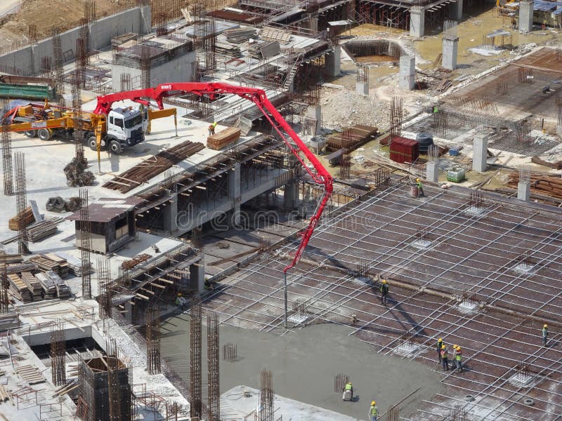Concreting Work by Construction Workers at the Construction Site ...