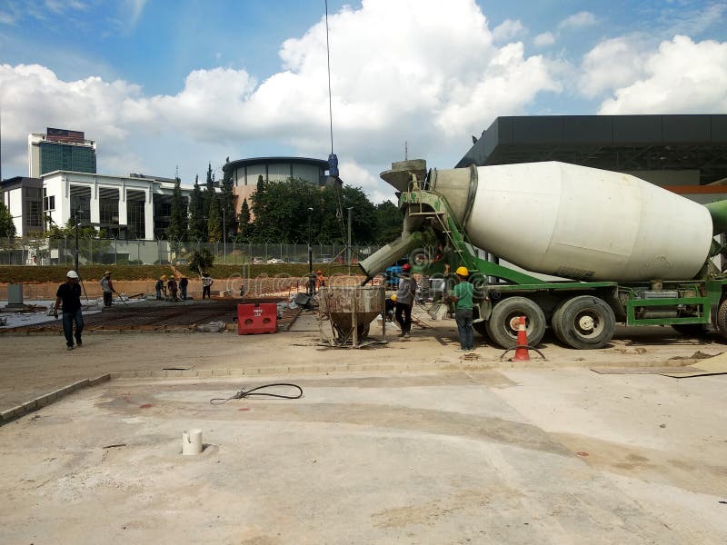 Concreting Work by Construction Workers at the Construction Site ...