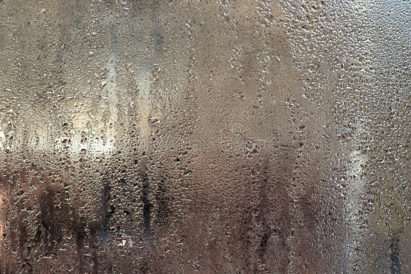 Condensation Forms Delicate Water Beads on Chilled Interior Glass ...