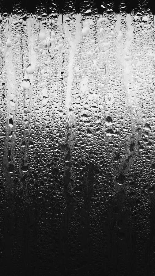 Condensation on glass stock photo. Image of form, monochrome - 65055998