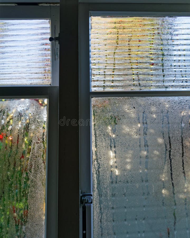 Condensation on the Inside of a Window in a Cold Damp House Stock Photo ...