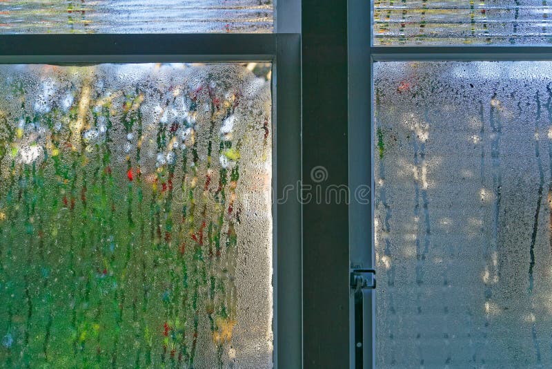 Condensation on the Inside of a Window in a Cold Damp House Stock Photo ...