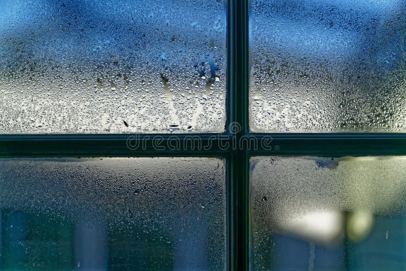 Condensation on the Inside of a Window in a Cold Damp House Stock Photo ...