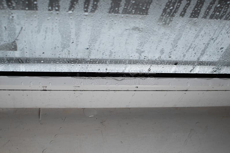 Condensation Forms on the Window, Water Flows through the Glass. Stock ...