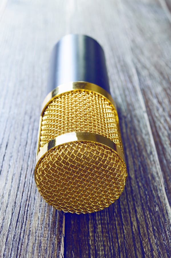 Condenser Gold Microphone on a Wooden Table. Stock Photo - Image of ...