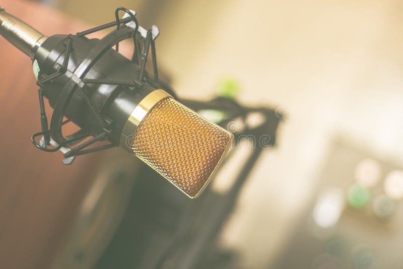 Condenser Microphone on a Stand Attached To a Table in a Professional ...