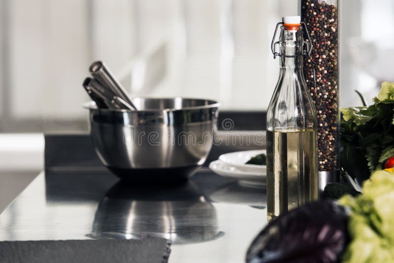 Condiment Tools on Kitchen Table. Vinegar, Pepper and Bowl on ...