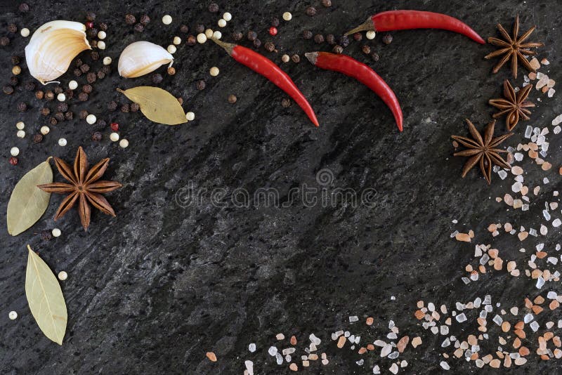 Condiments on Black Stone Table. Top View with Copy Space Stock Photo ...