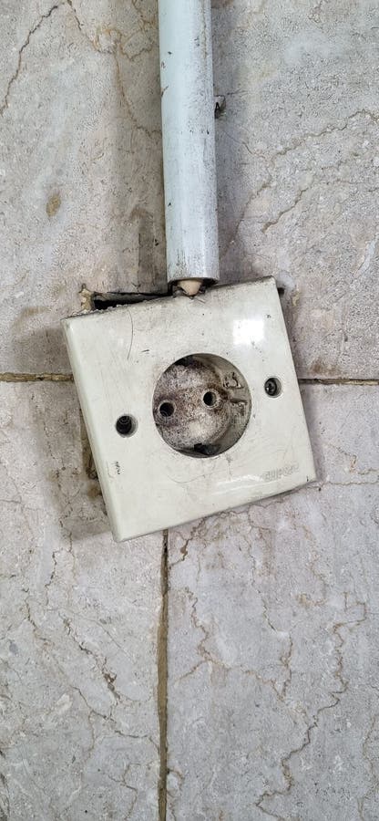 The Condition of the Power Outlet that is Tilted and Starting To Break ...