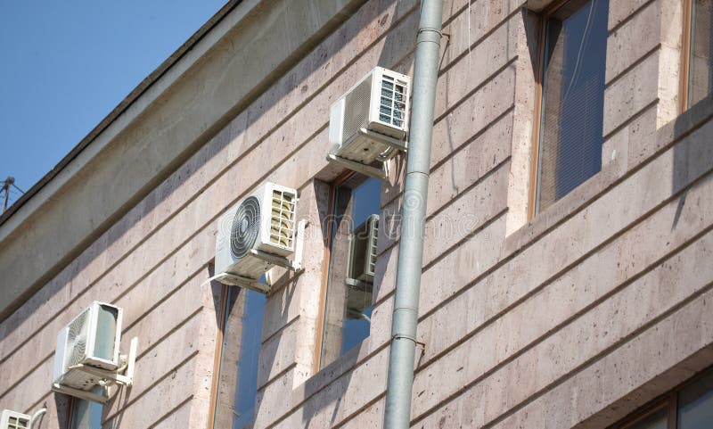 Conditioner Mounted on the Wall of the Building Stock Photo - Image of ...