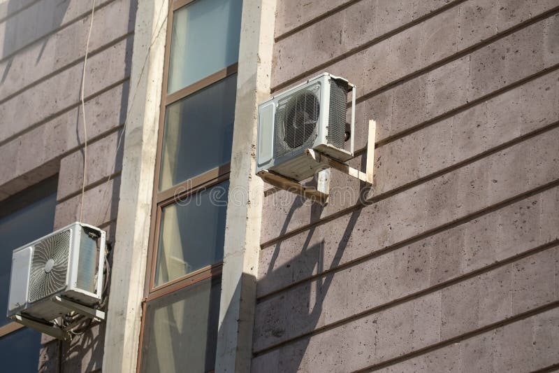 Conditioner Mounted on the Wall of the Building Stock Image - Image of ...