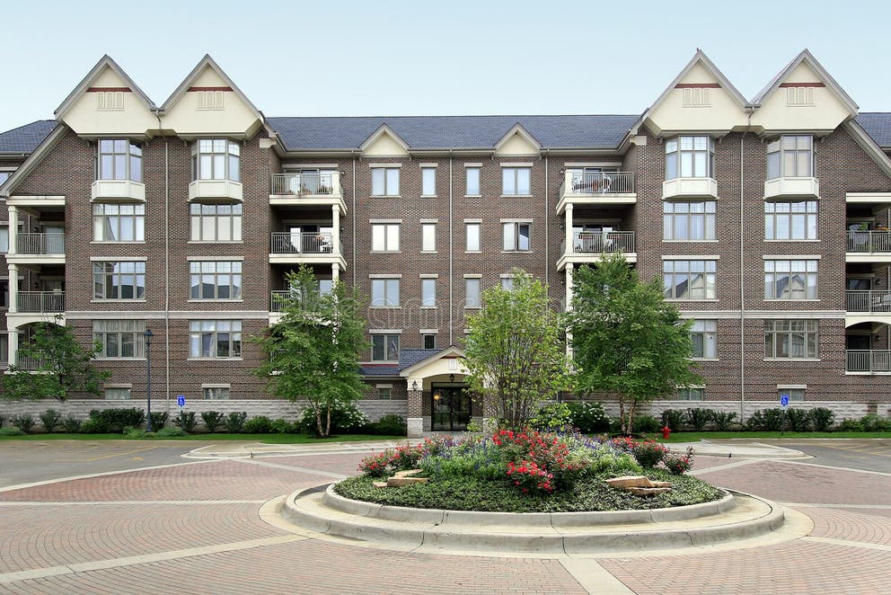 Condo Building with Circular Drive Stock Image - Image of residence ...