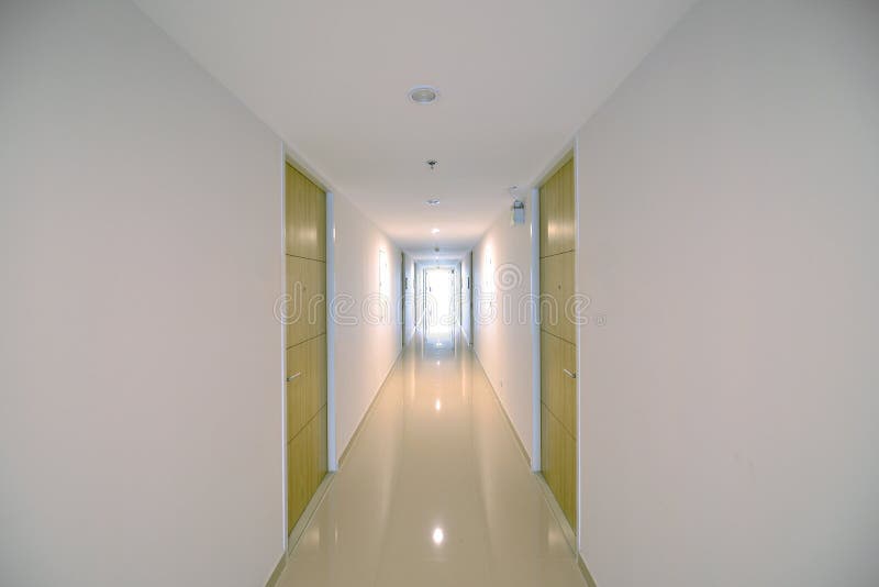 Condo Corridor with Wooden Doors in Condominium, Modern Design Stock ...