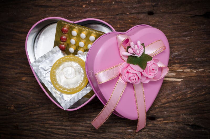 Condom and Contraceptive Pill in Box Stock Photo - Image of pills ...