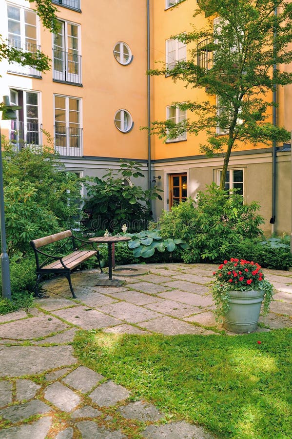 Condominium Courtyard stock photo. Image of bench, architecture - 33982312
