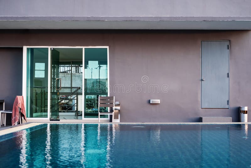 Condominium Public Area, Swimming Pool on Deck Stock Photo - Image of ...