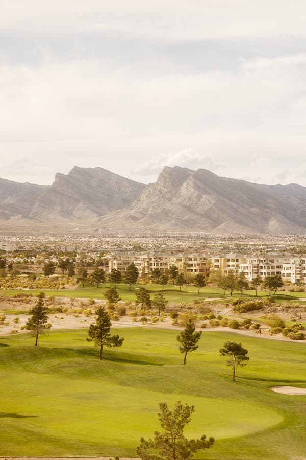Condos Betweeen Golf Course and Mountains Stock Image - Image of resort ...