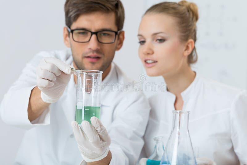 Conducting an experiment stock image. Image of scientific - 80800765