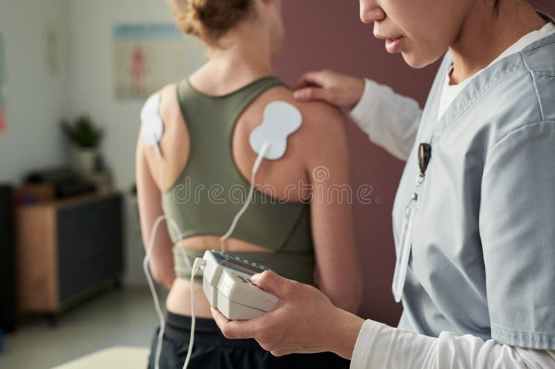 Physiotherapist Conducting Back Rehabilitation Session Stock Photos ...