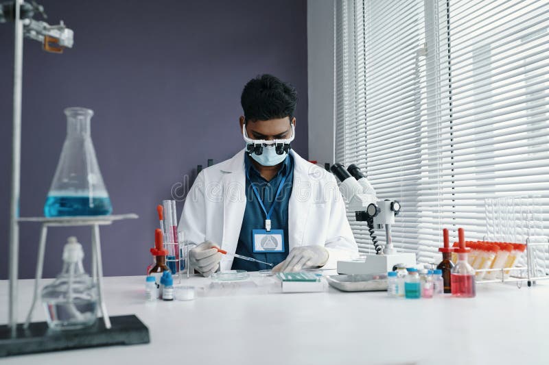 Conducting Scientific Experiments in Modern Laboratory Stock Photo ...