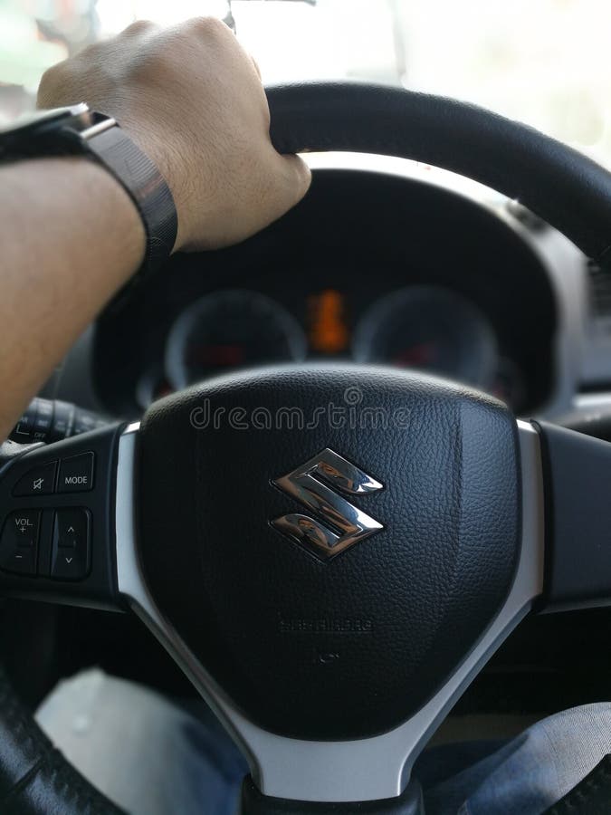 Conduzca a Suzuki Car imagen de archivo editorial. Imagen de rueda ...